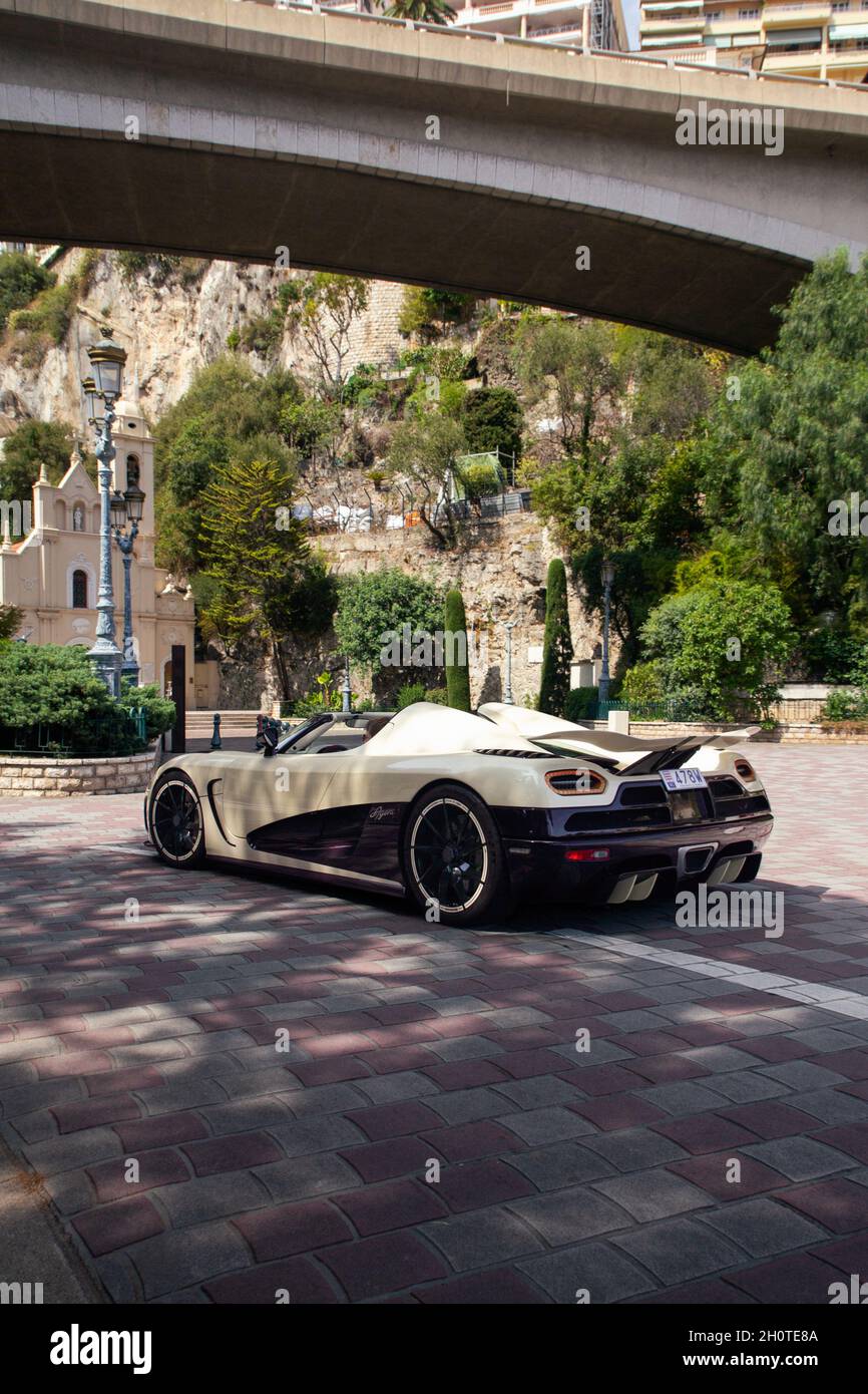 White with purple carbon fiber Koenigsegg Agera R supercar driven on a ...