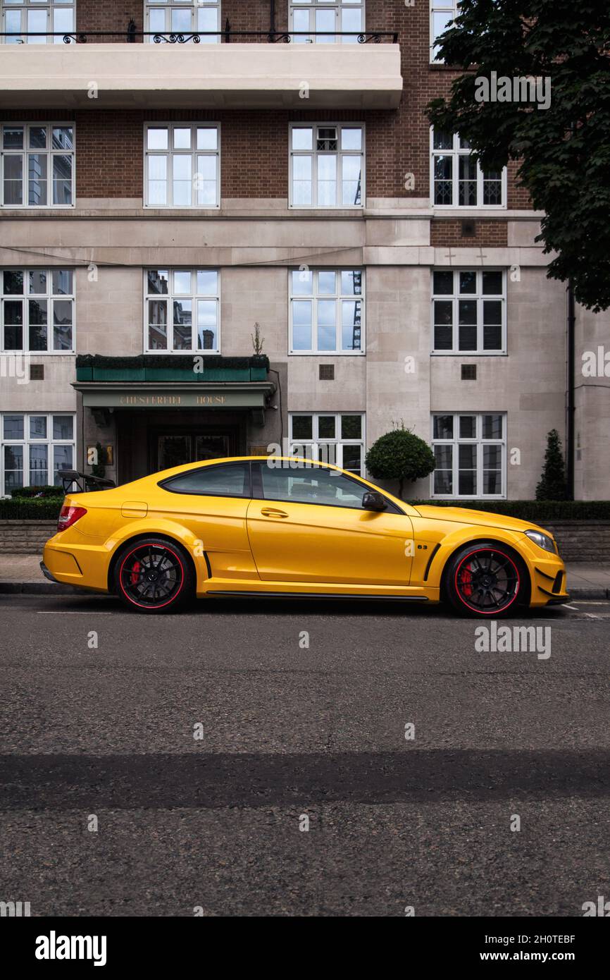 Yellow Mercedes-Benz C63 AMG Black Series performance coupe parked on a ...