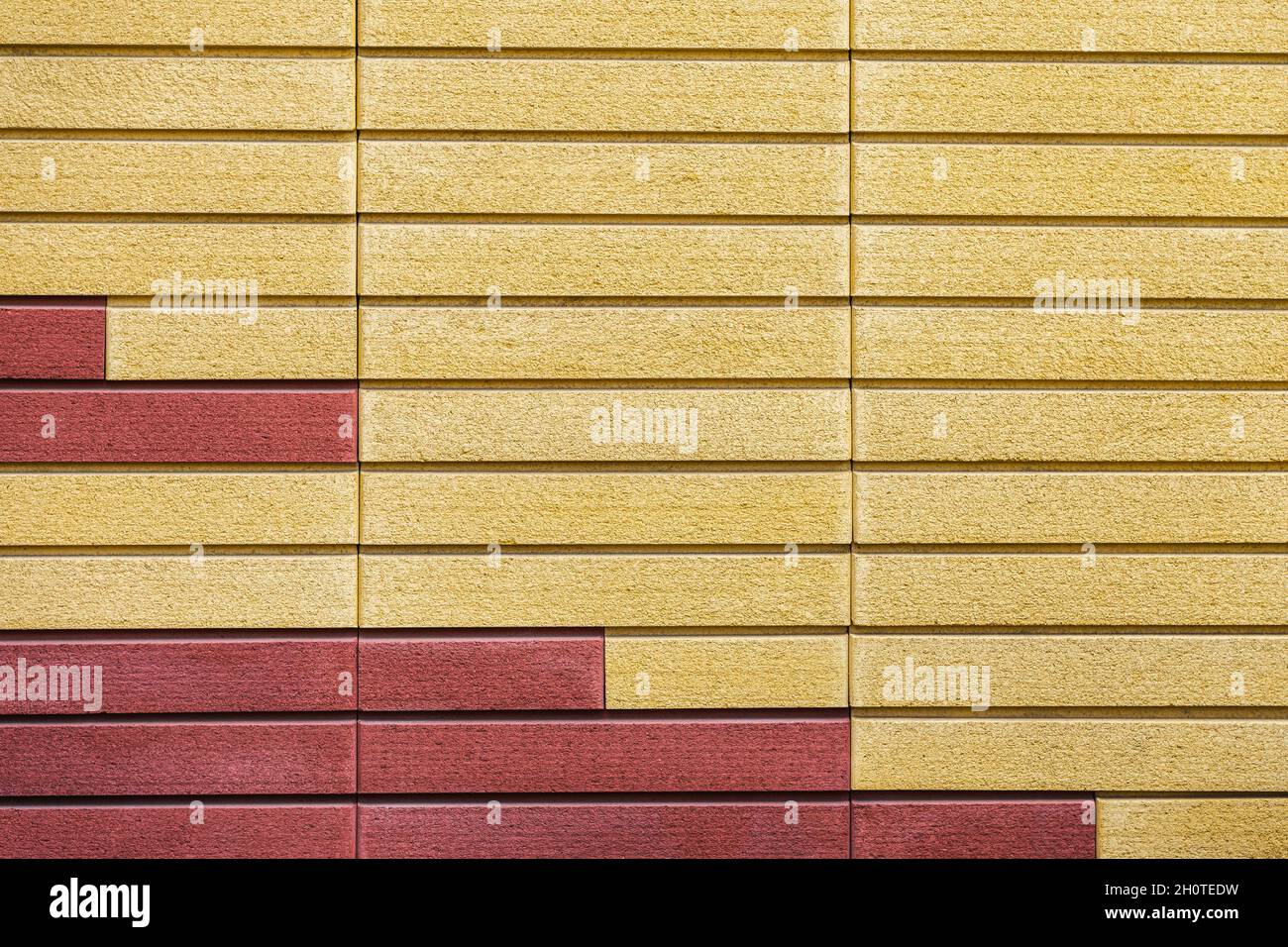 Wall of colored building bicolor blocks. Modern background and texture ...