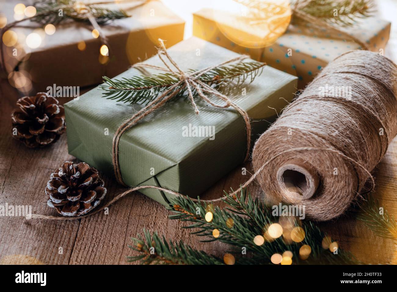 Christmas zero waste packaging gift boxes wrapped in kraft paper with ...