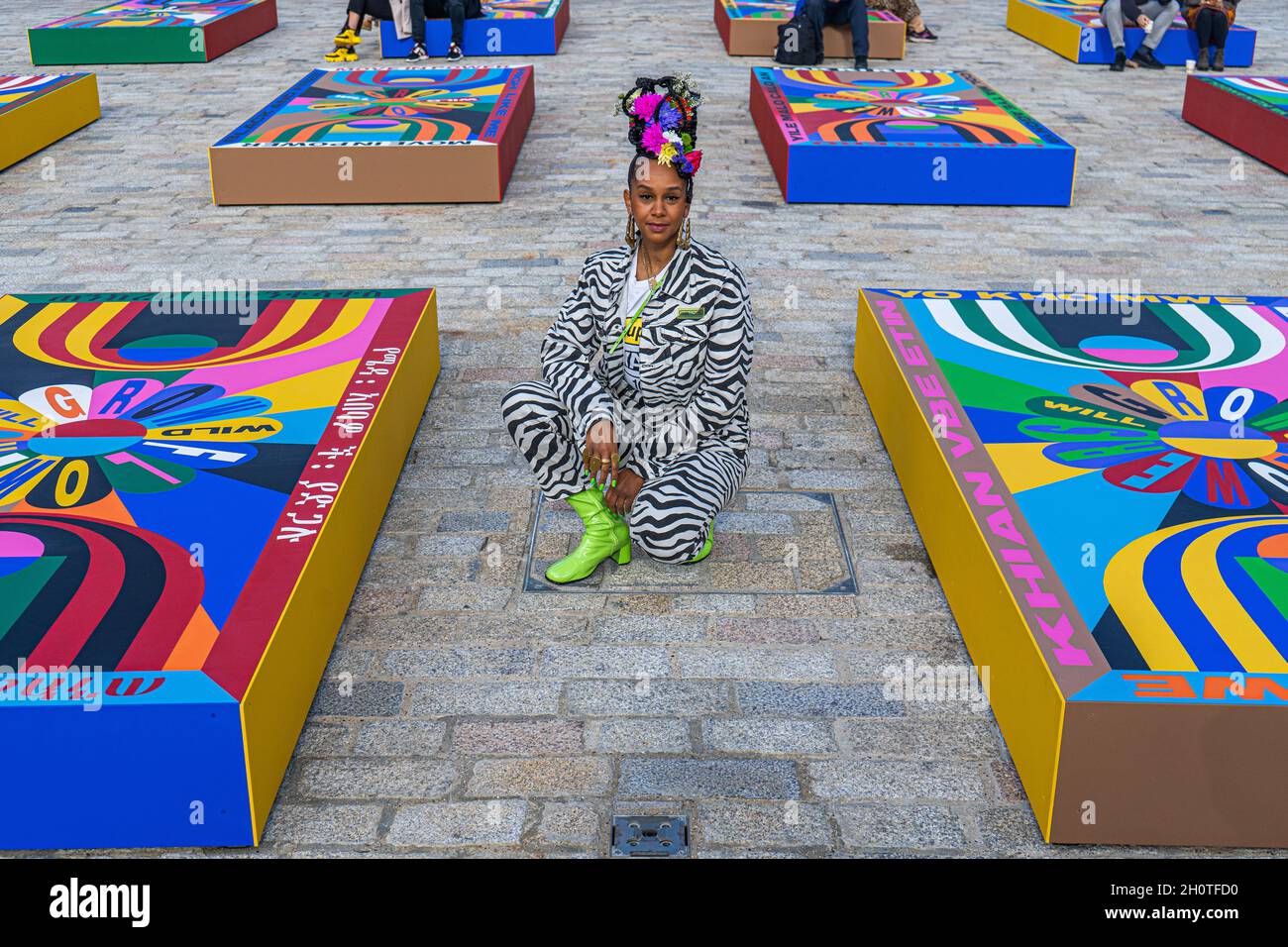 Lakwena Maciver poses with her works Basketball Paintings (2021) at ...