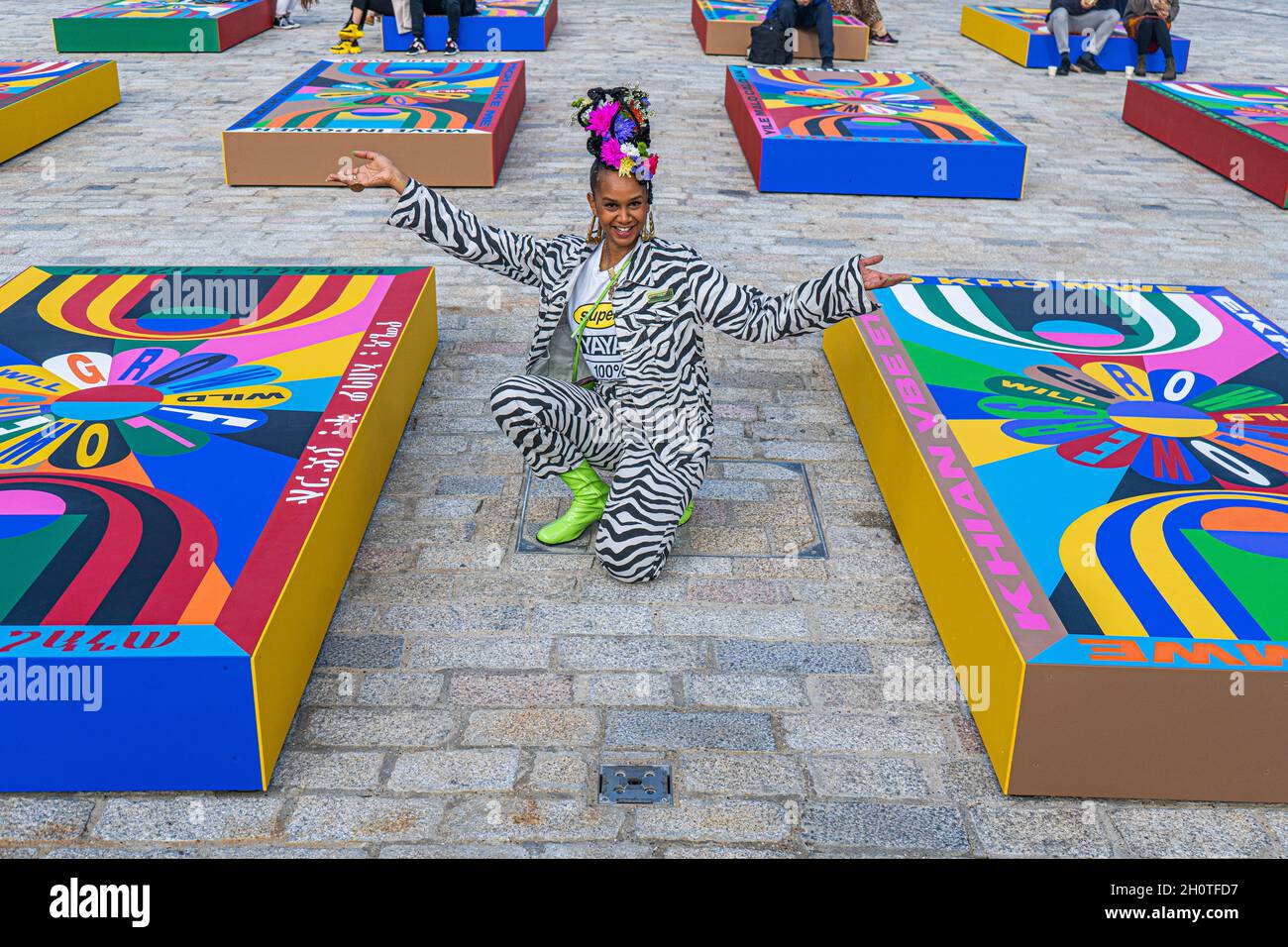 Lakwena Maciver poses with her works Basketball Paintings (2021) at ...