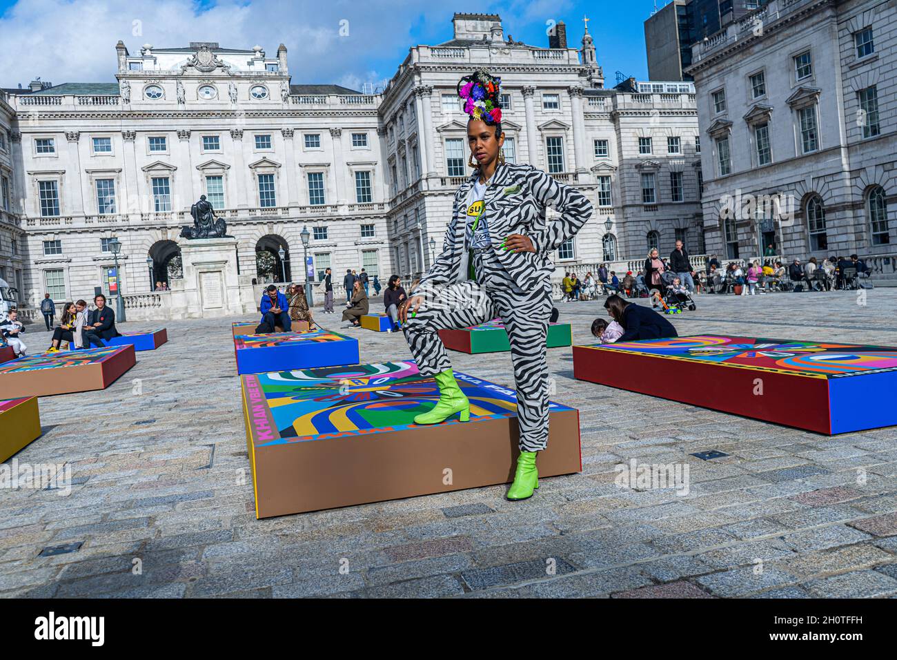 Lakwena Maciver poses with her works Basketball Paintings (2021) at ...