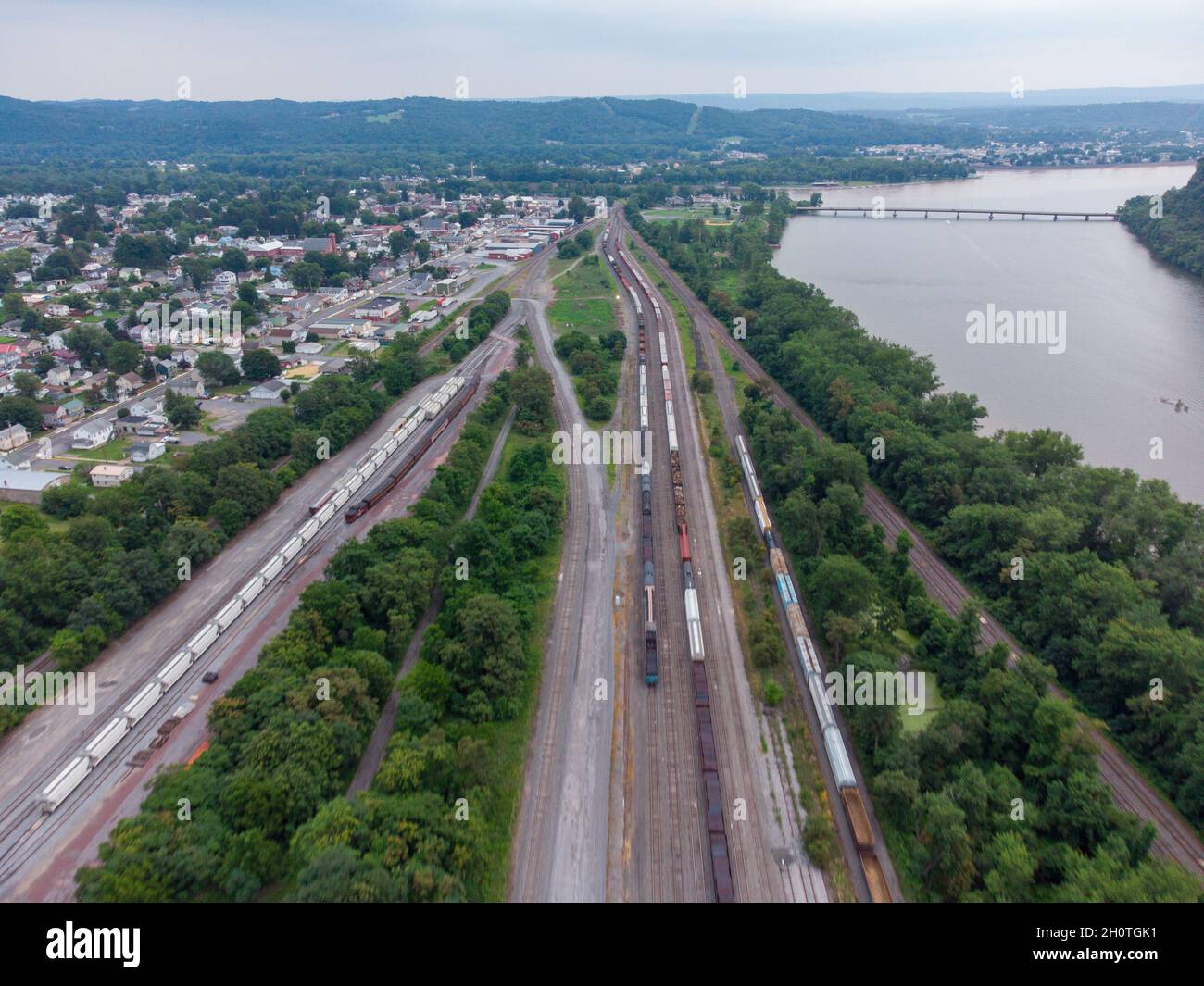 Aerial shot of a beautiful natural view on the train railway and a ...