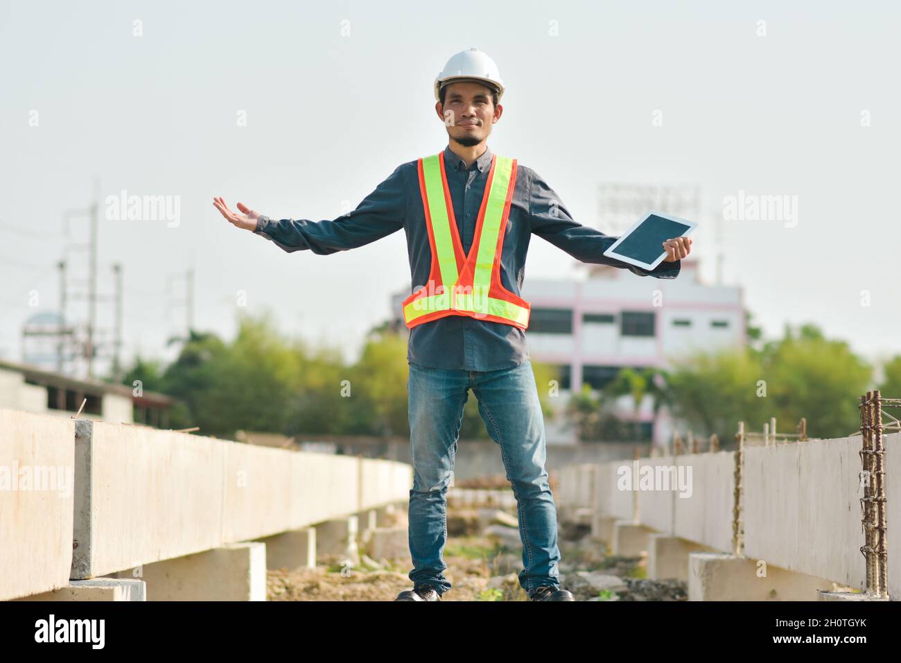 Engineer inspector on site construction by tablet technology Stock ...