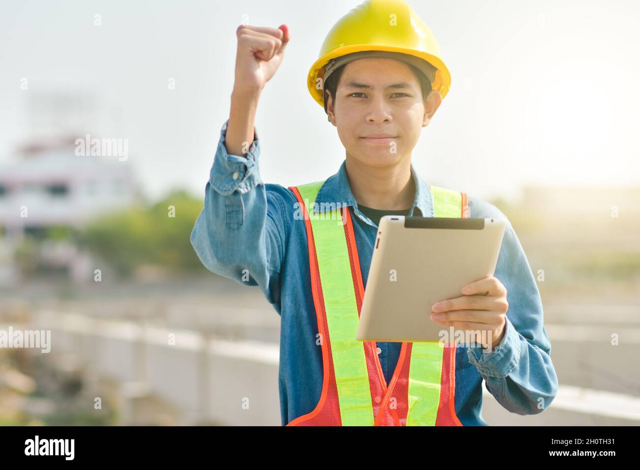 Engineer inspector on site construction by tablet technology Stock ...