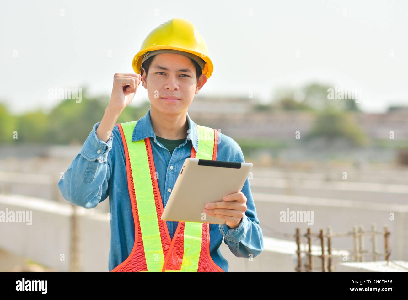 Engineer inspector on site construction by tablet technology Stock ...