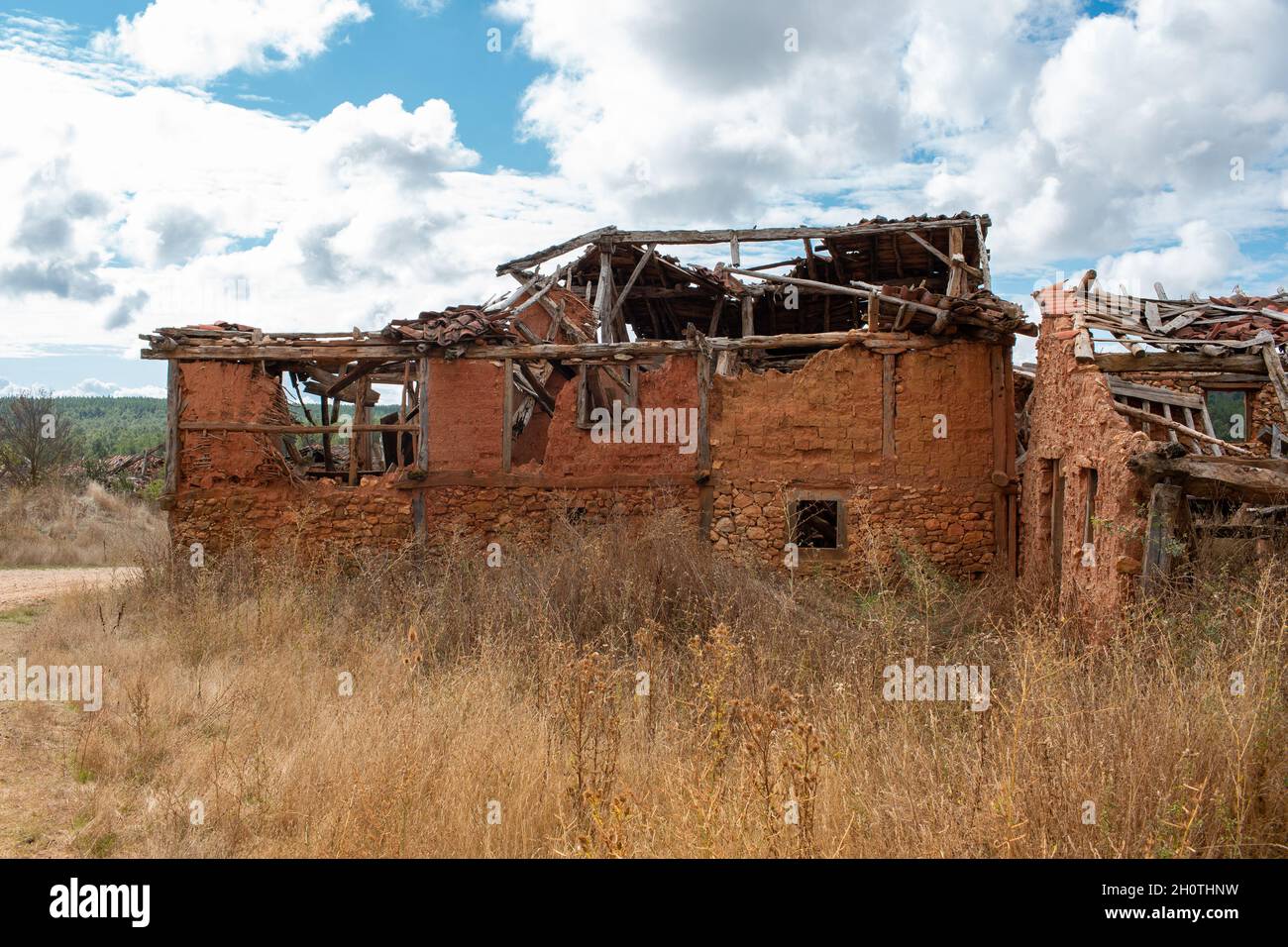 Abandoned village with ruined houses Stock Photo - Alamy