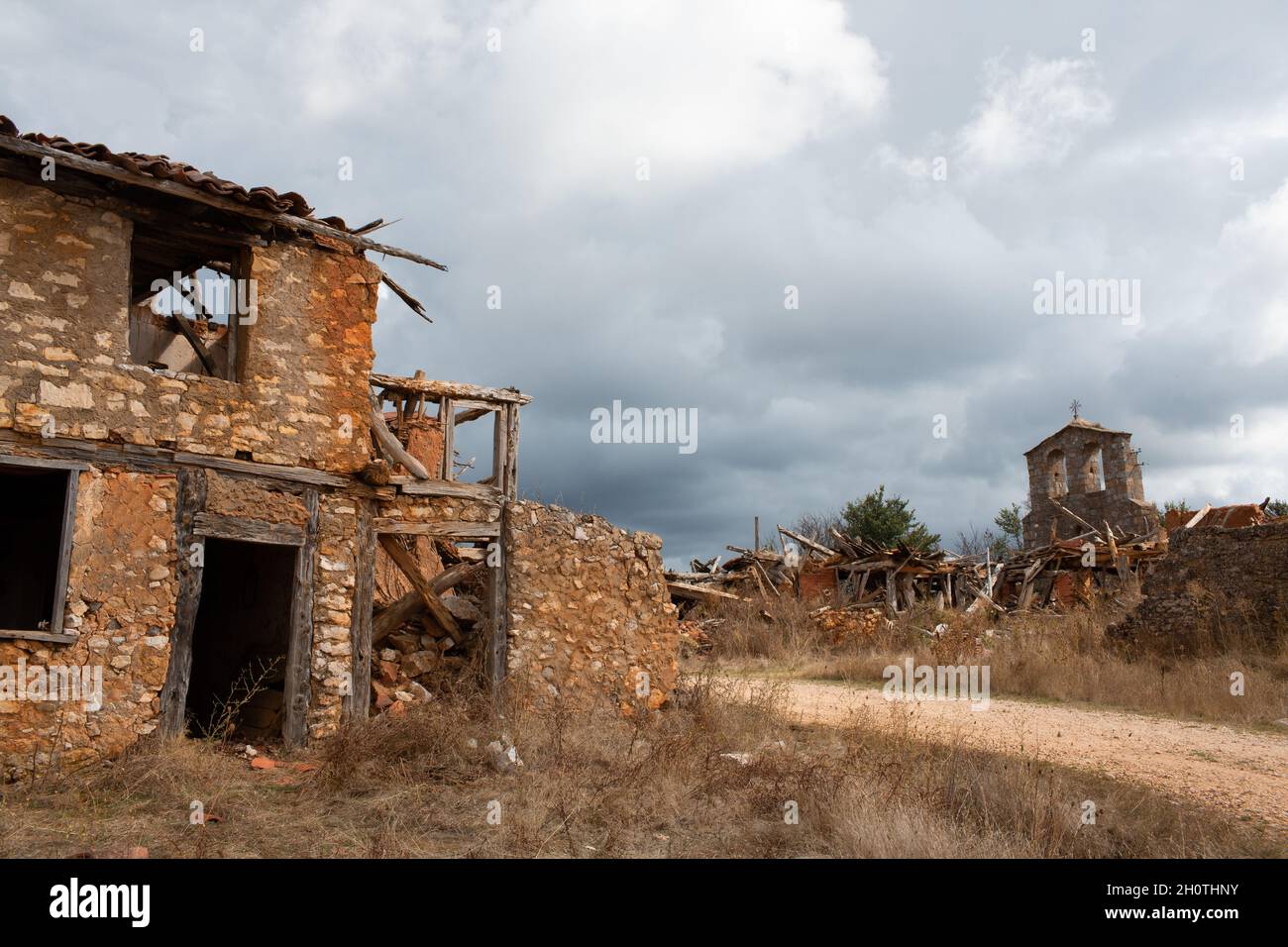 Abandoned village with ruined houses Stock Photo - Alamy