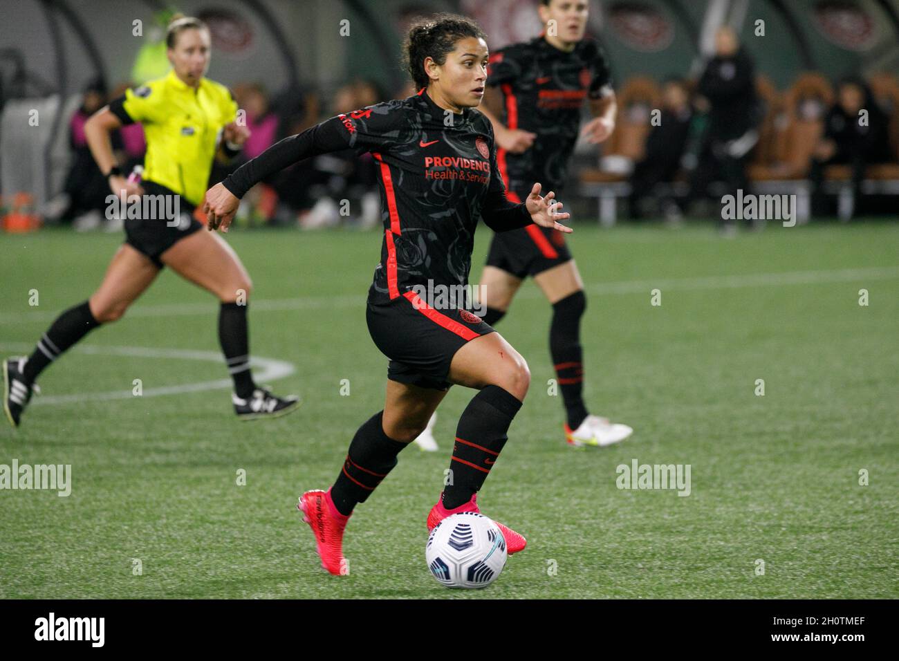 Rocky Rodriguez (11) struggles to keep the ball in bounds. The Portland ...