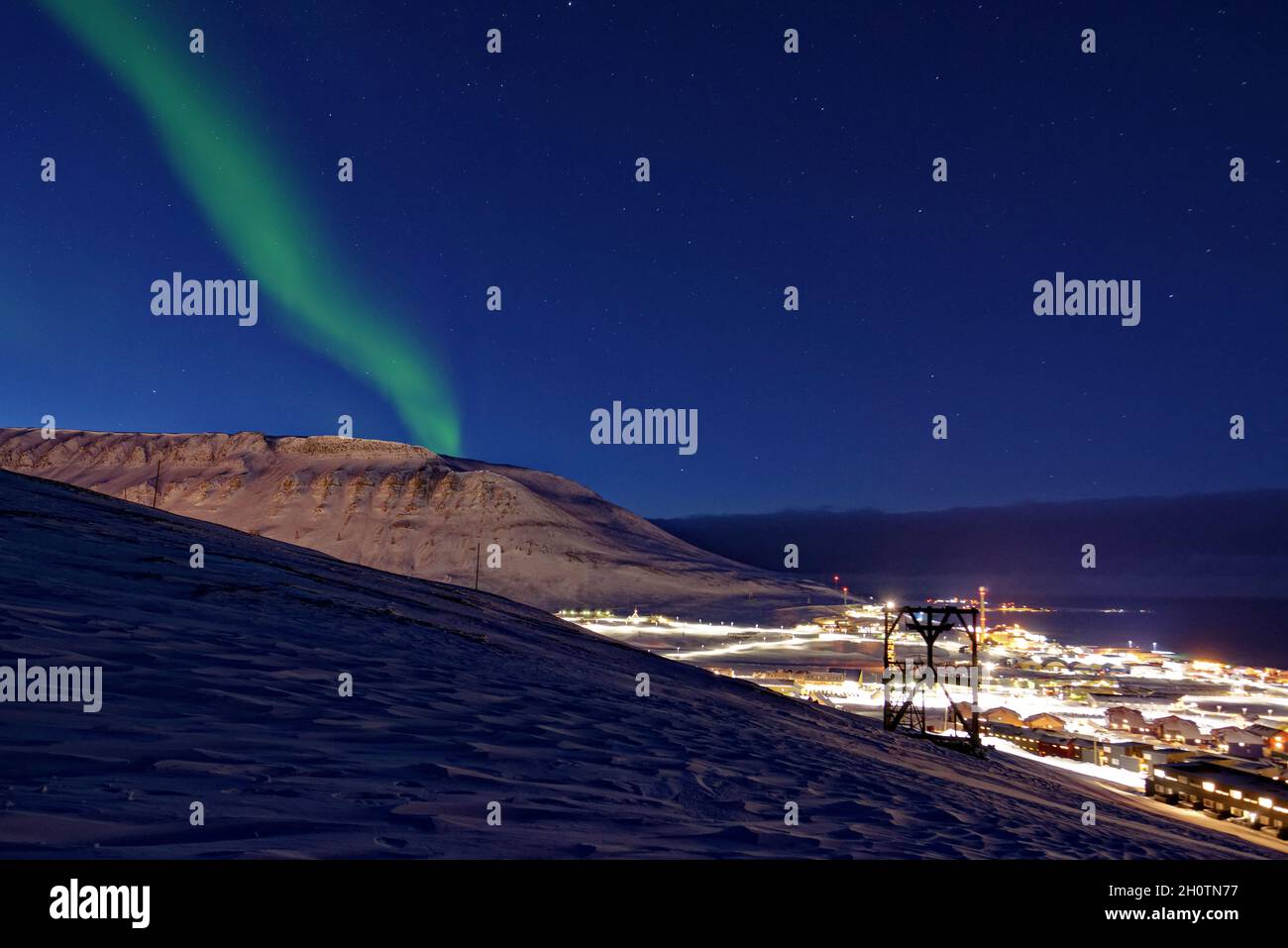 Dark winter season on Svalbard with polar night and northern lights ...