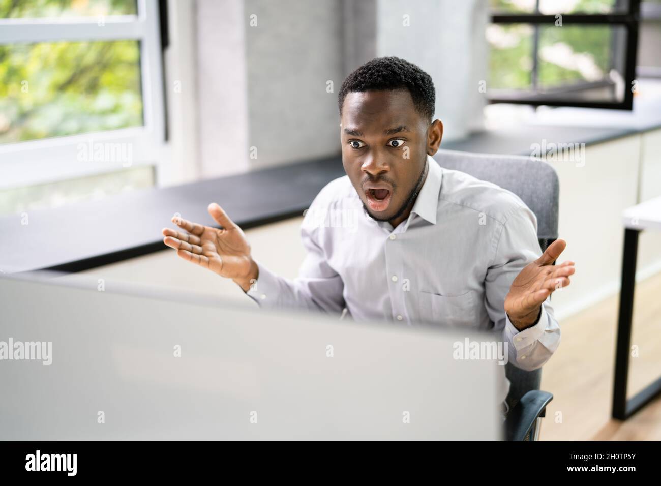 Portrait shocked african man hi-res stock photography and images - Alamy