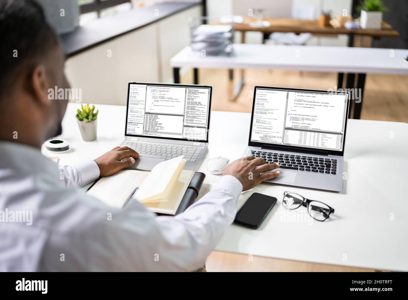 African American Programmer Man Coding On Computer Stock Photo - Alamy