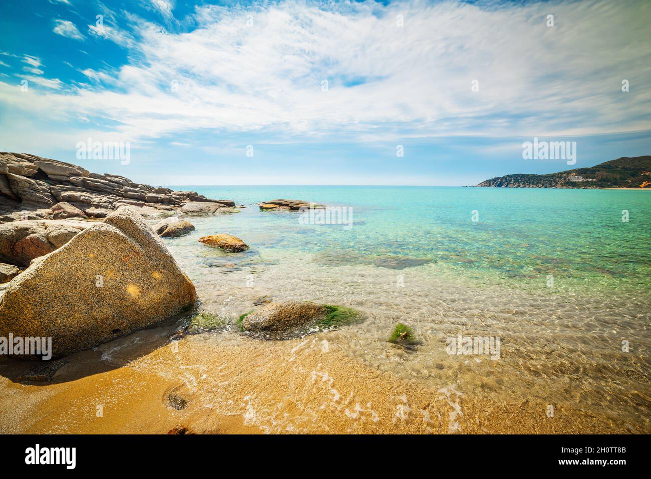 Rocks and golden sand in Solanas beach. Sardinia, Italy Stock Photo - Alamy