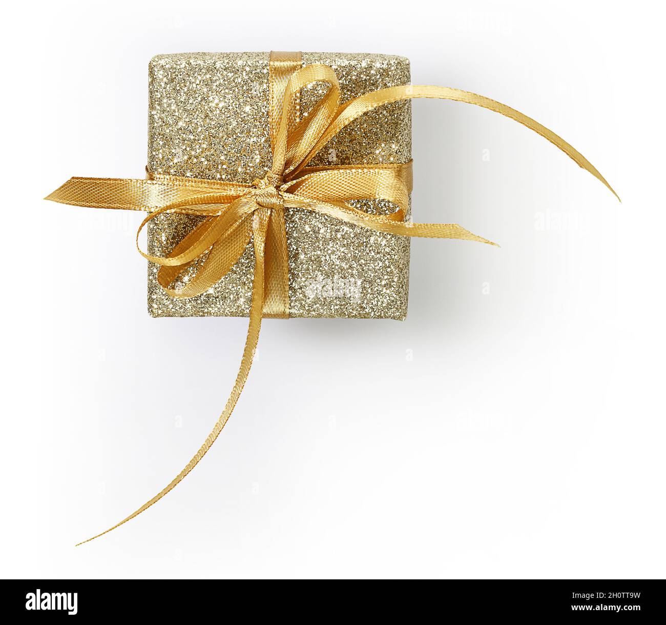 merry christmas gift golden box with ribbon bow, isolated on white ...