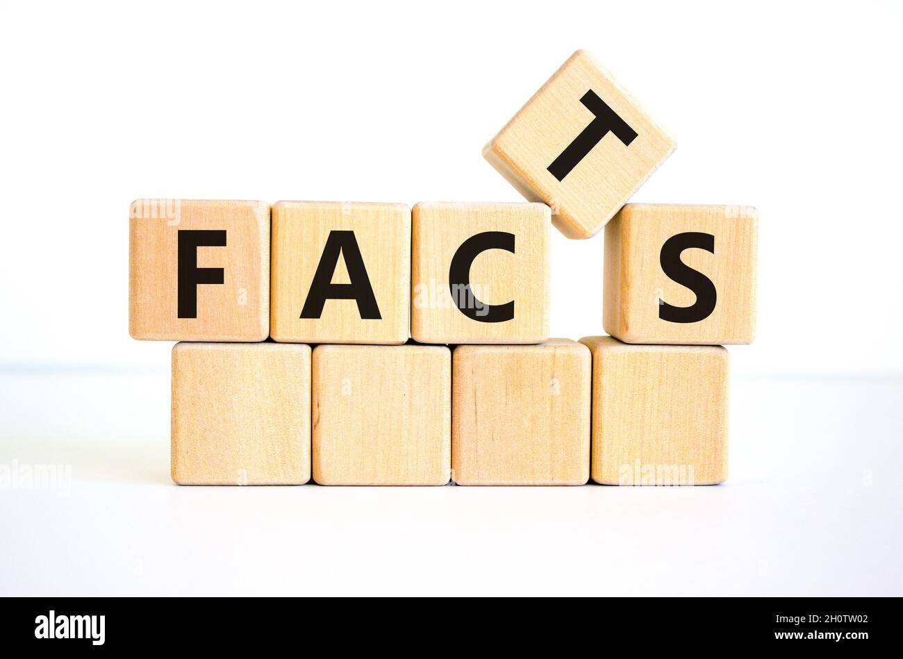 Facts symbol. The concept word 'facts' on wooden cubes. Beautiful white ...