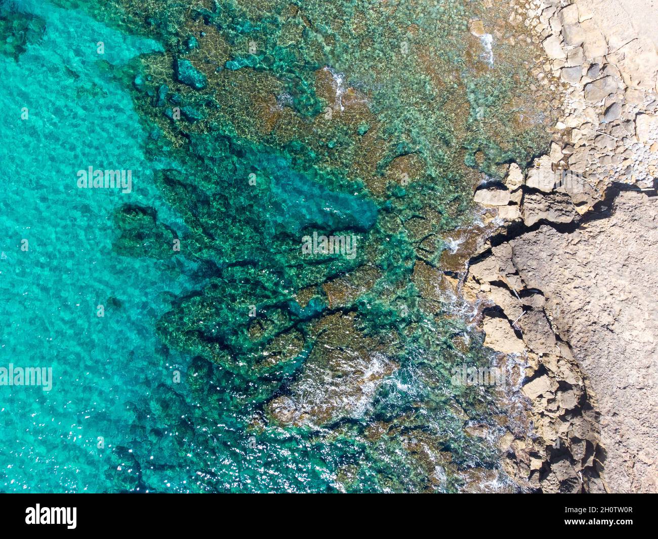 Rocks above beautiful clear hi-res stock photography and images - Alamy