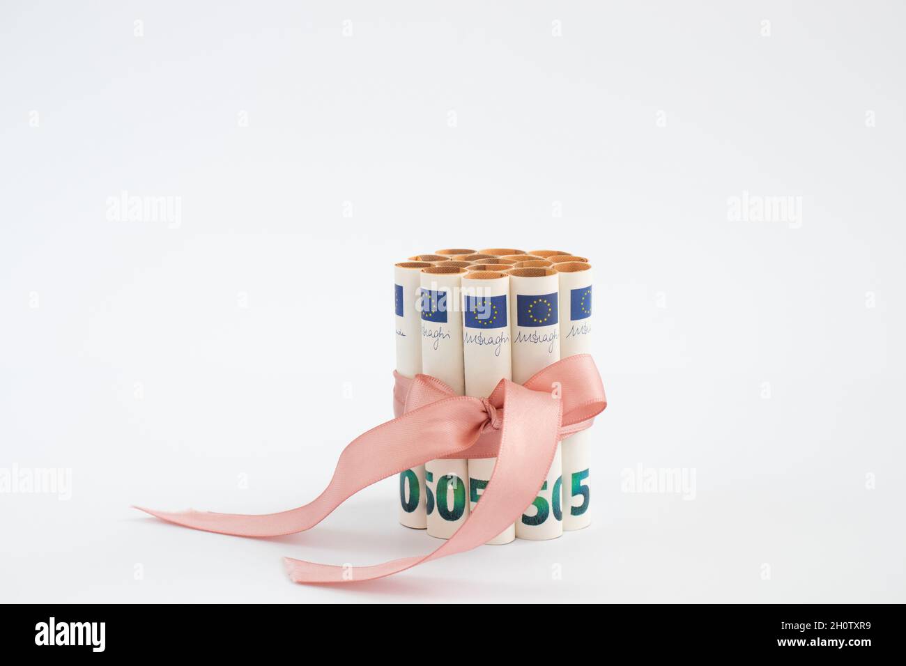 Money tied with a bow hi-res stock photography and images - Alamy
