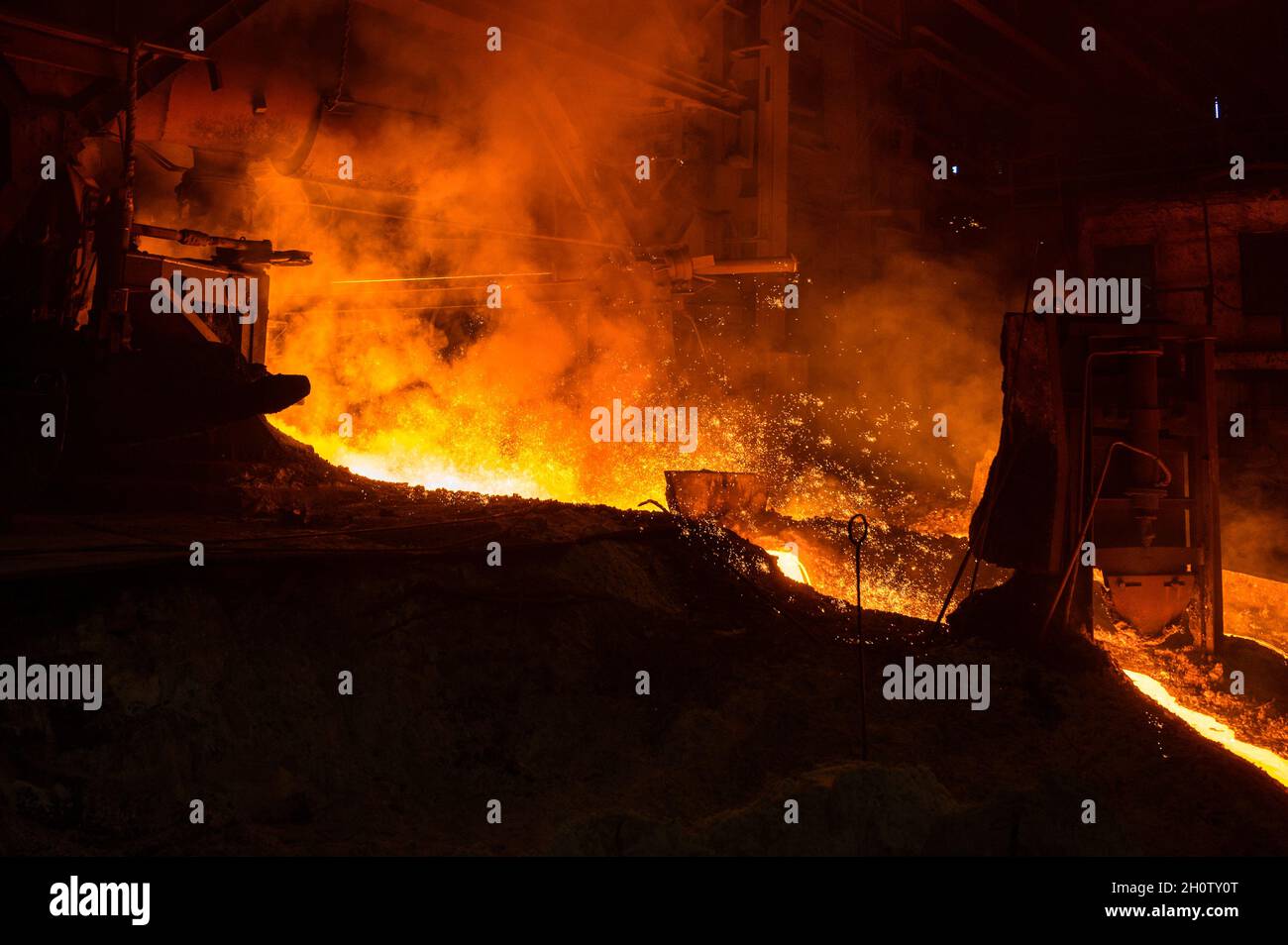 Blast furnace metal release, a lot of smoke Stock Photo - Alamy