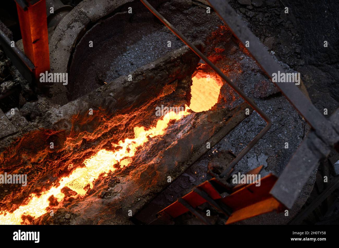 The hot inner surface of the metallurgical ladle. A hole in a thick ...
