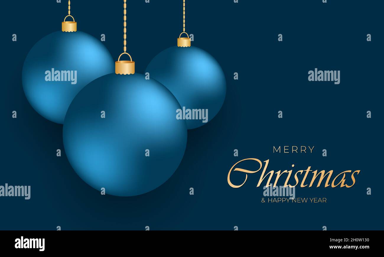 Blue festive christmas balls hanging on gold chains on a navy blue ...