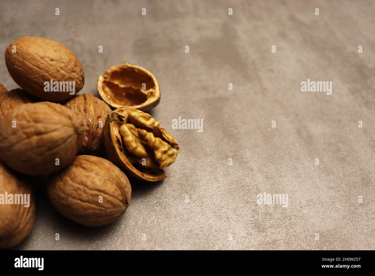 Food wallpaper. Walnuts on old table background for banner concept ...