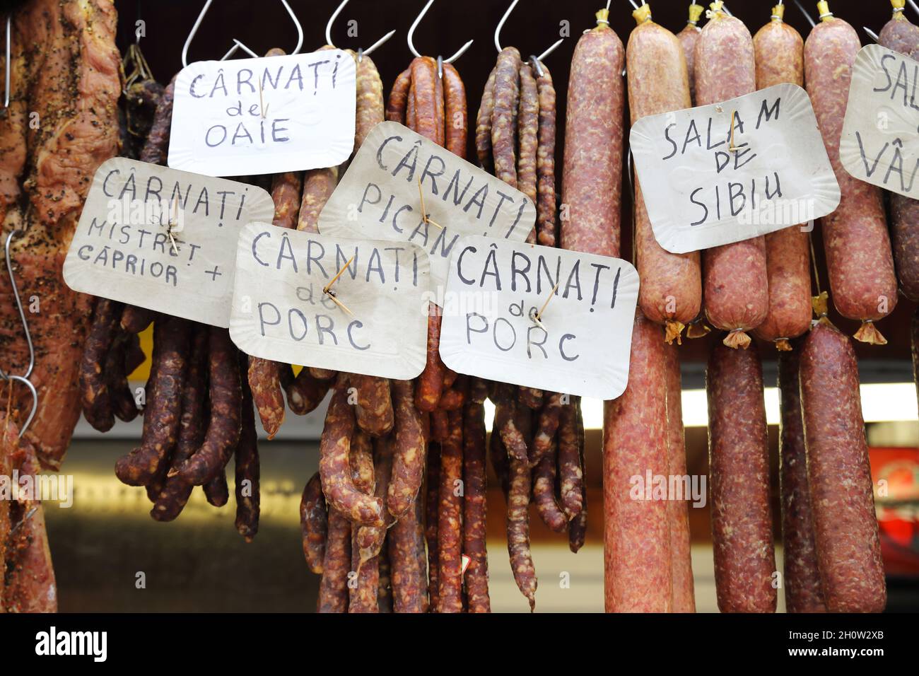 Traditional Romanian salami and sausages for sale on a stall near Sibiu ...