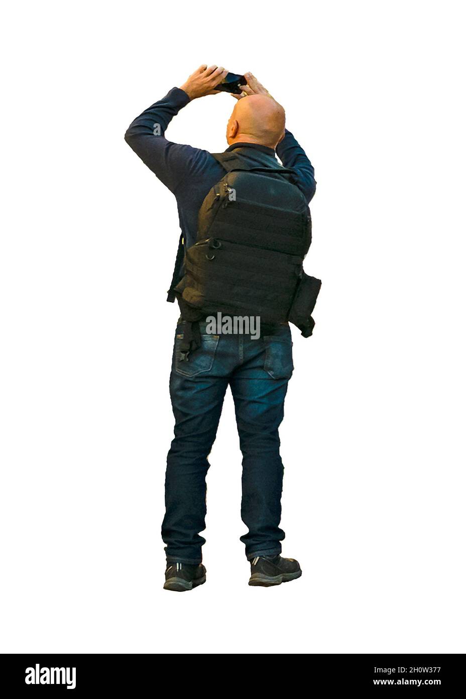 Back view isolated man taking photos with mobile phone Stock Photo - Alamy