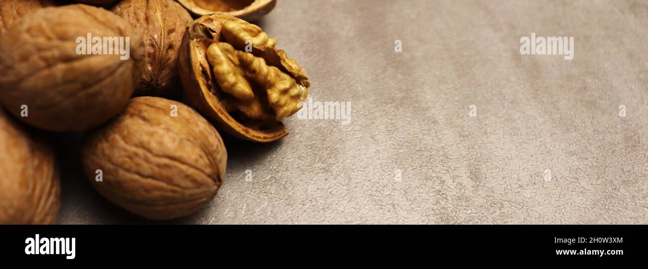 Food wallpaper. Walnuts on old table background for banner concept ...