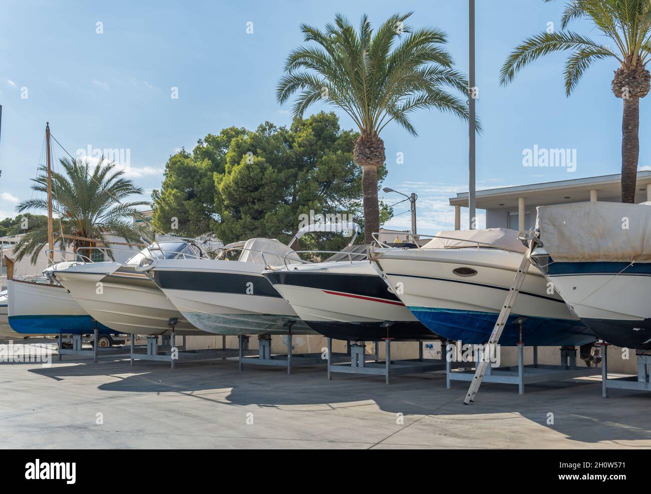 Recreational boats supported on metal tripods for future restoration. S ...