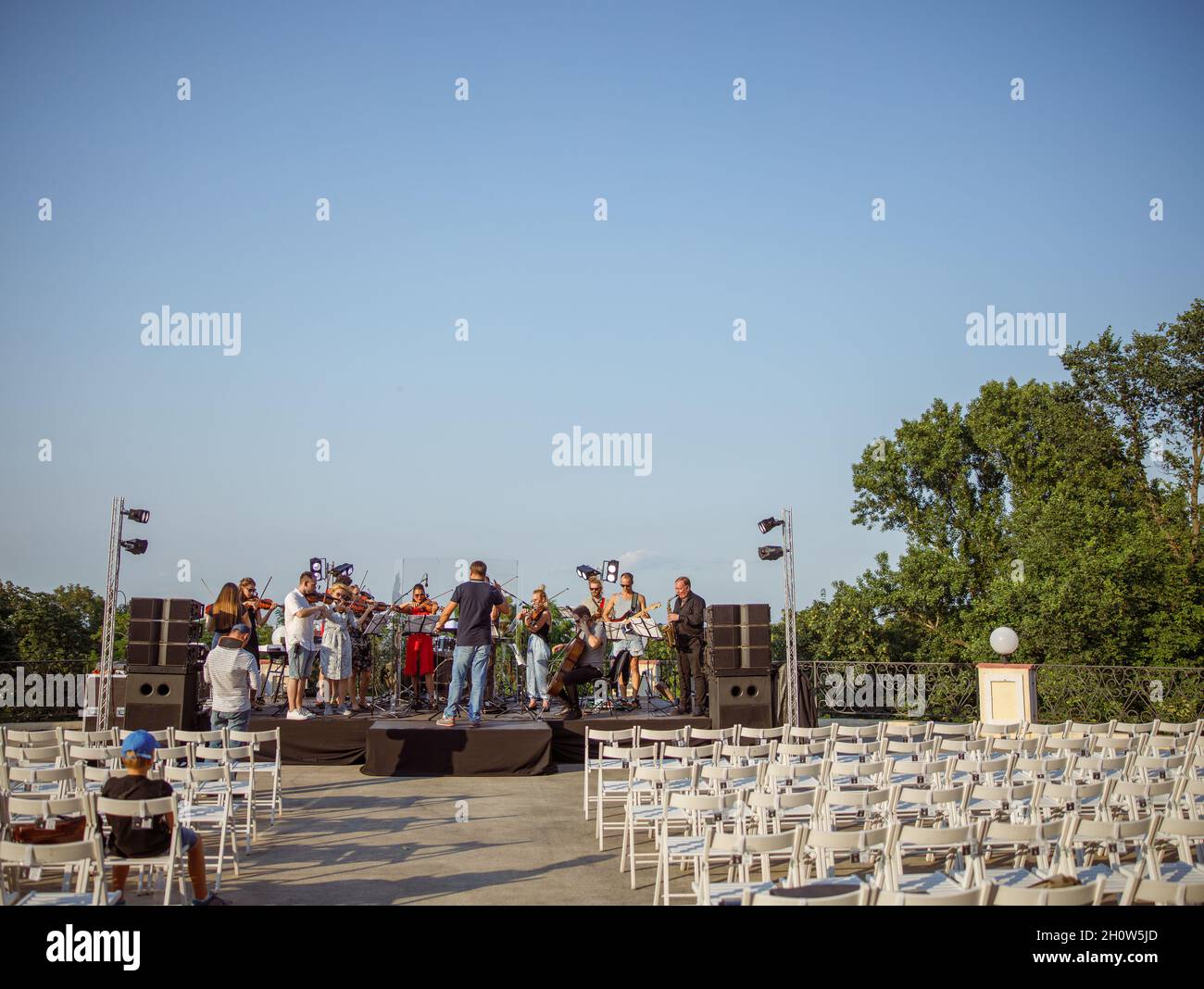 Musicians performing classic instrumental music on outdoor stage Stock ...