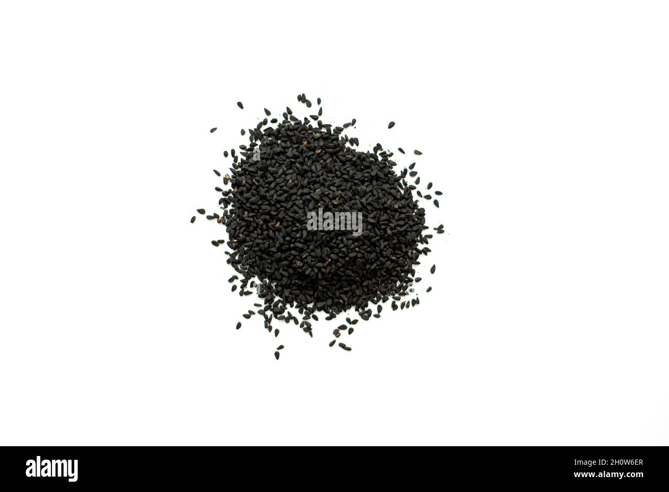 Black seed, black cumin or nigella sativa on a white background with ...