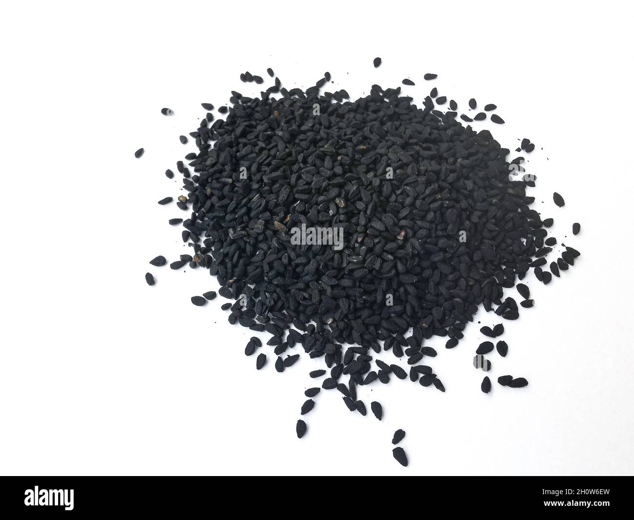 Black seed, black cumin or nigella sativa on a white background with ...