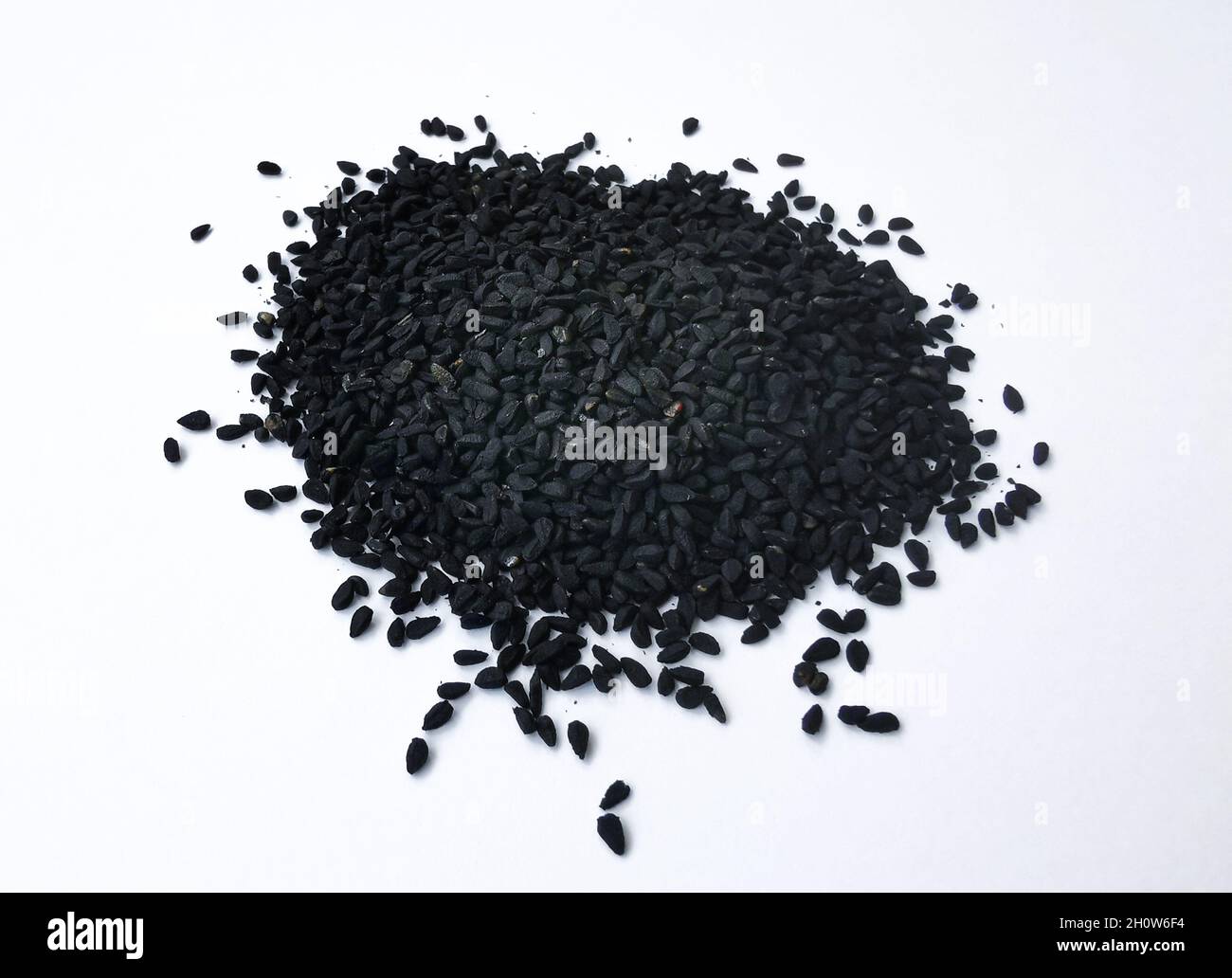 Black seed, black cumin or nigella sativa on a white background with ...