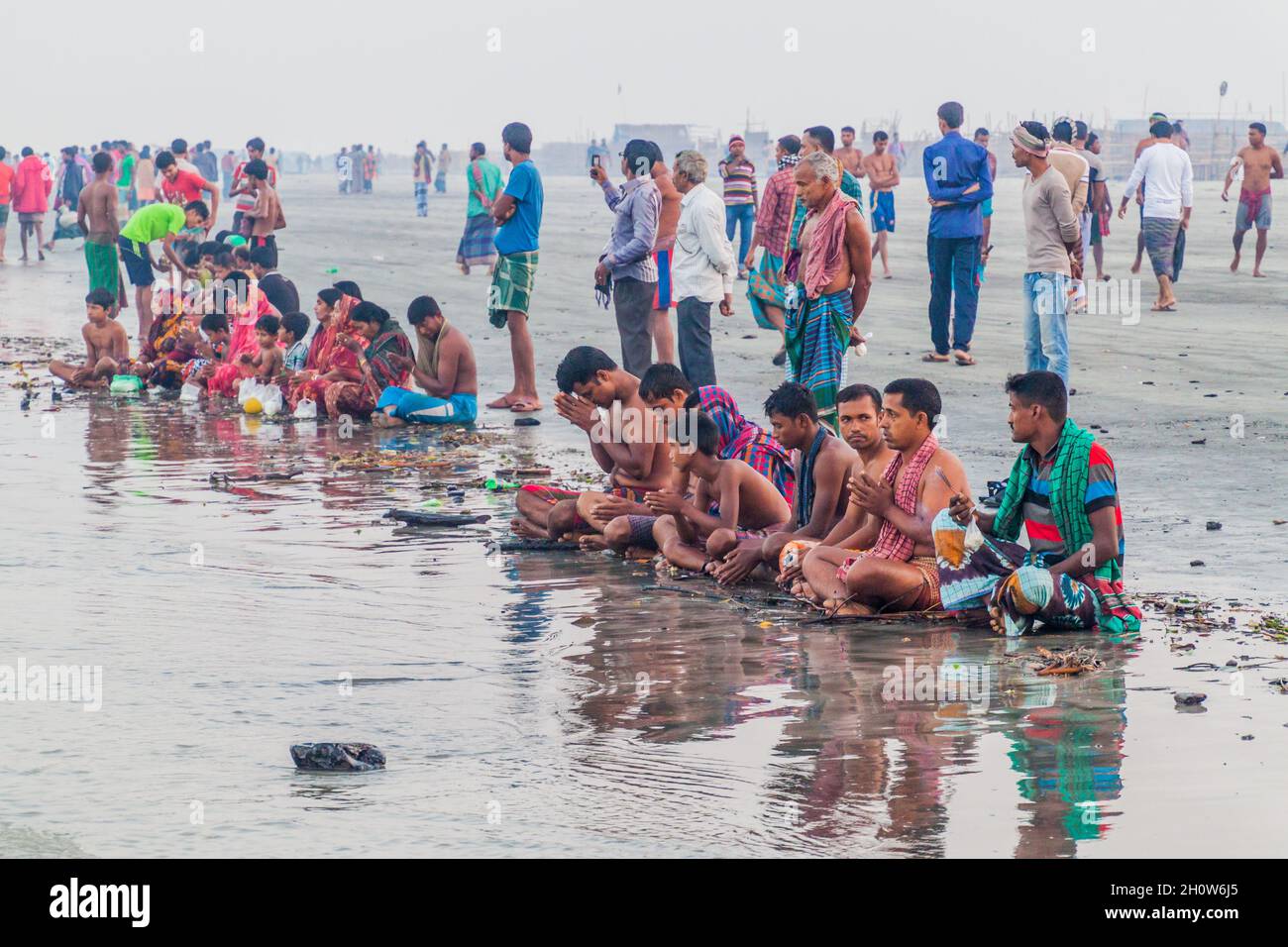 DUBLAR CHAR, BANGLADESH - NOVEMBER 14, 2016: Hindu devotees praying ...