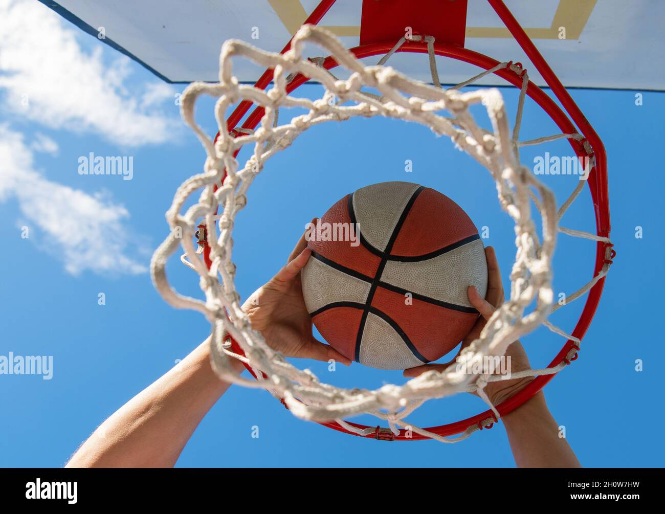 hands of basketball player throws the ball into the hoop, success Stock ...