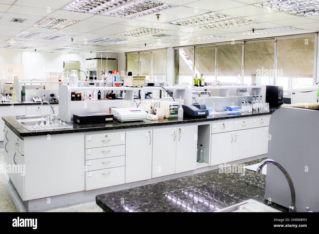 Interior of a laboratory full of apparatus and equipment Stock Photo ...