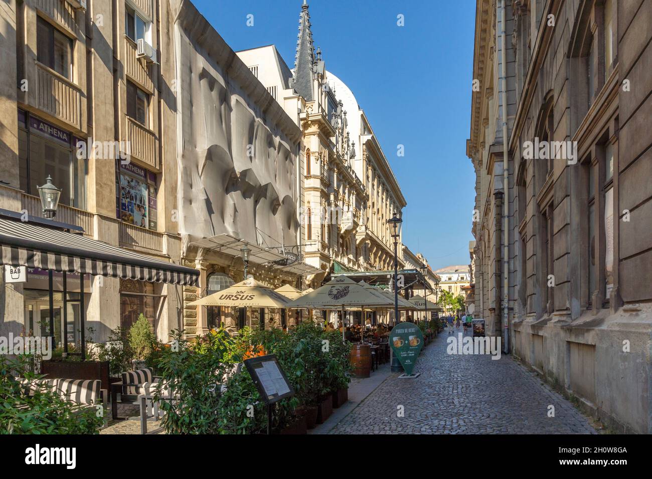 BUCHAREST, ROMANIA - AUGUST 16, 2021: Typical street and buiding at ...