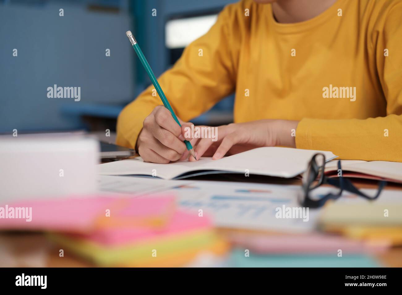 Close up hands with pen writing on notebook. Education concept Stock ...
