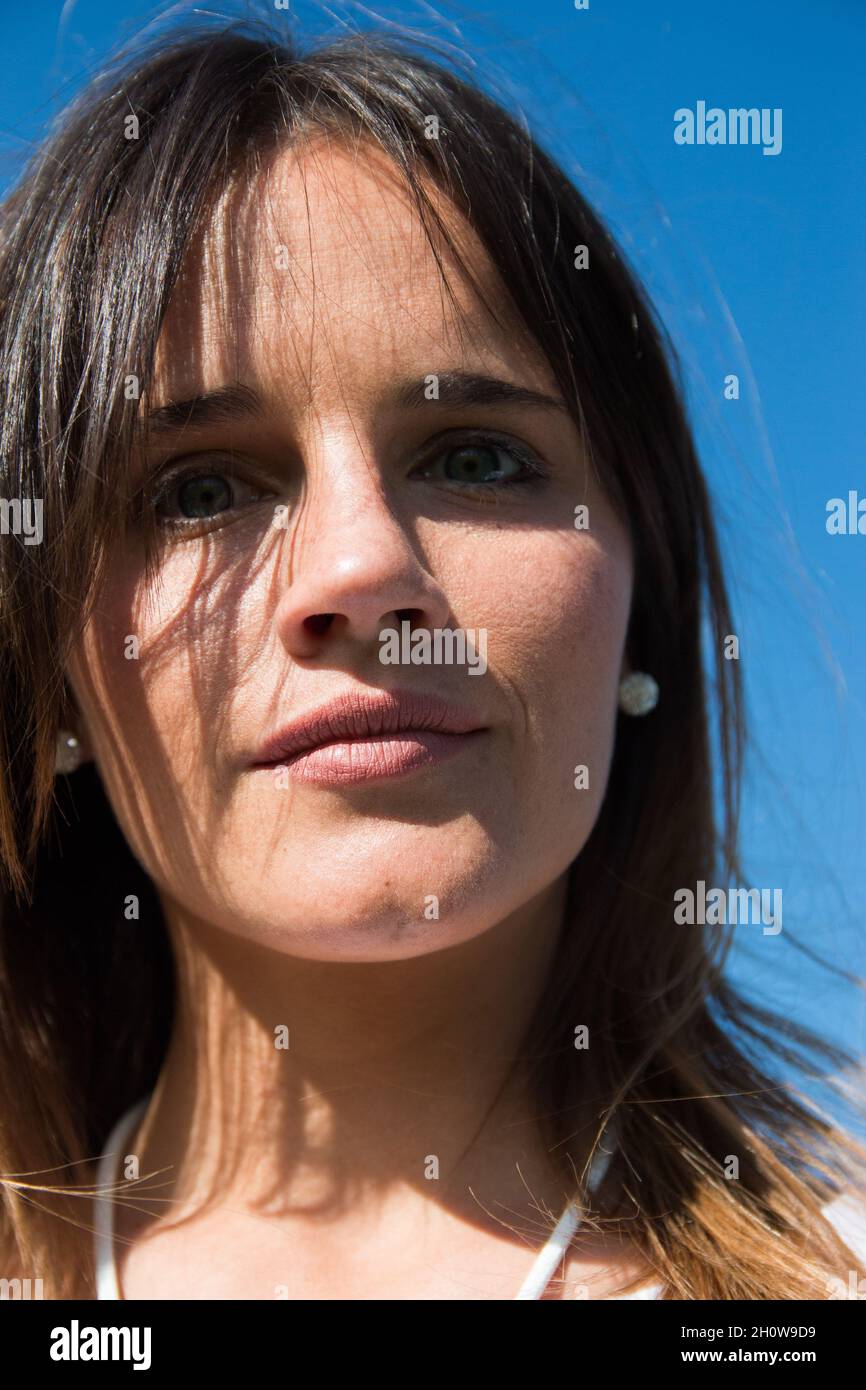 Portrait of a beautiful young green-eyed Argentinian female Stock Photo ...