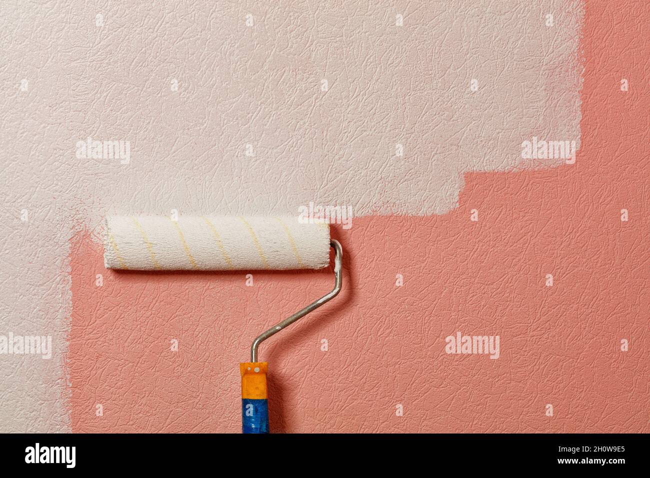 Rolling paint on wallpaper hi-res stock photography and images - Alamy