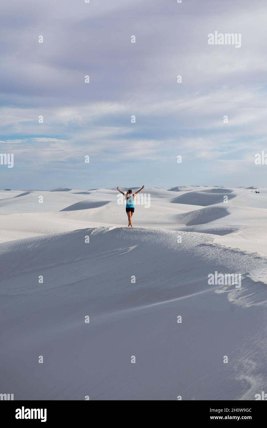 Girl exploring sand dunes in White Sands National Monument, New Mexico ...