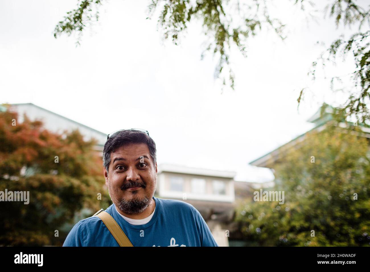 Man in Mid 40's Smiling outside Cincinnati Zoo Stock Photo - Alamy