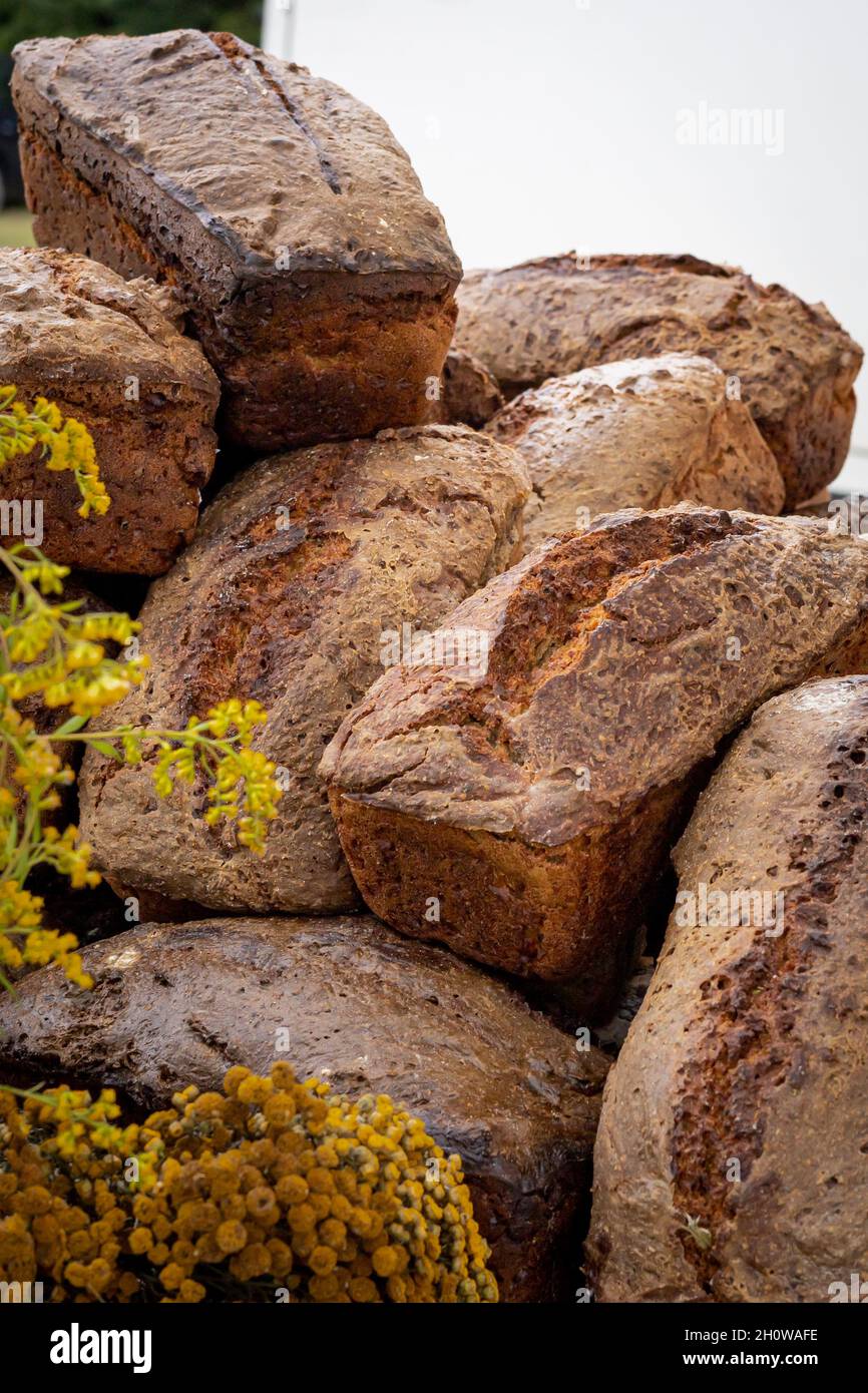 A pile of loaves of fresh artisan bread Stock Photo - Alamy