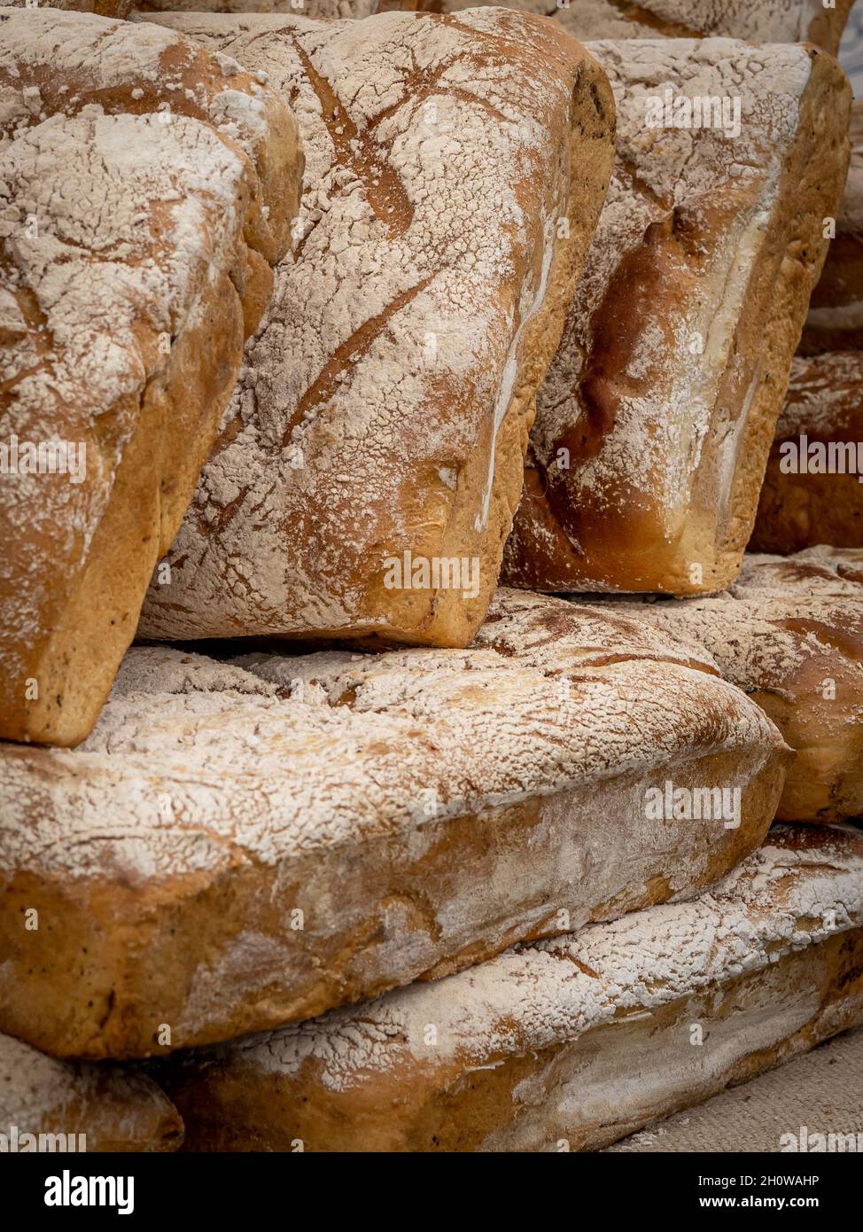 A pile of loaves of fresh artisan bread Stock Photo - Alamy
