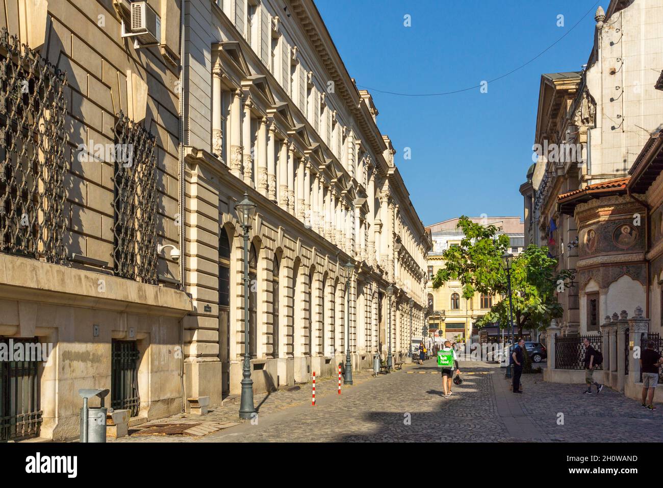 BUCHAREST, ROMANIA - AUGUST 16, 2021: Typical street and buiding at ...