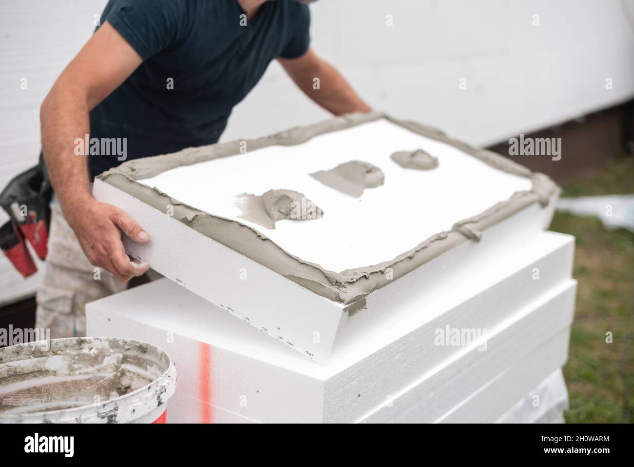 Styrofoam block prepared for gluing to the wall Stock Photo - Alamy