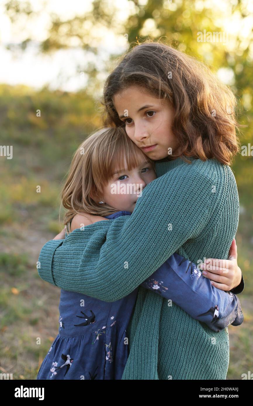 Two Sad Girls Hugging