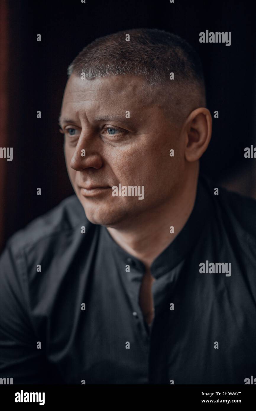 Serious middle-aged man with a deadpan expression Stock Photo - Alamy