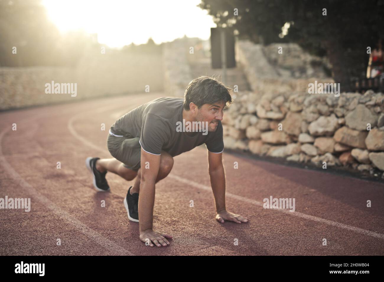 Jogging man track hi-res stock photography and images - Alamy